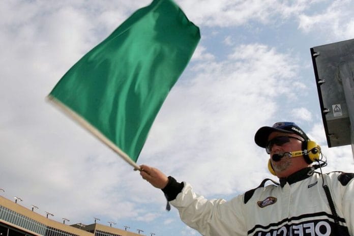 Story Behind NASCAR Flags: Decoding the Symbolism of Race Signals